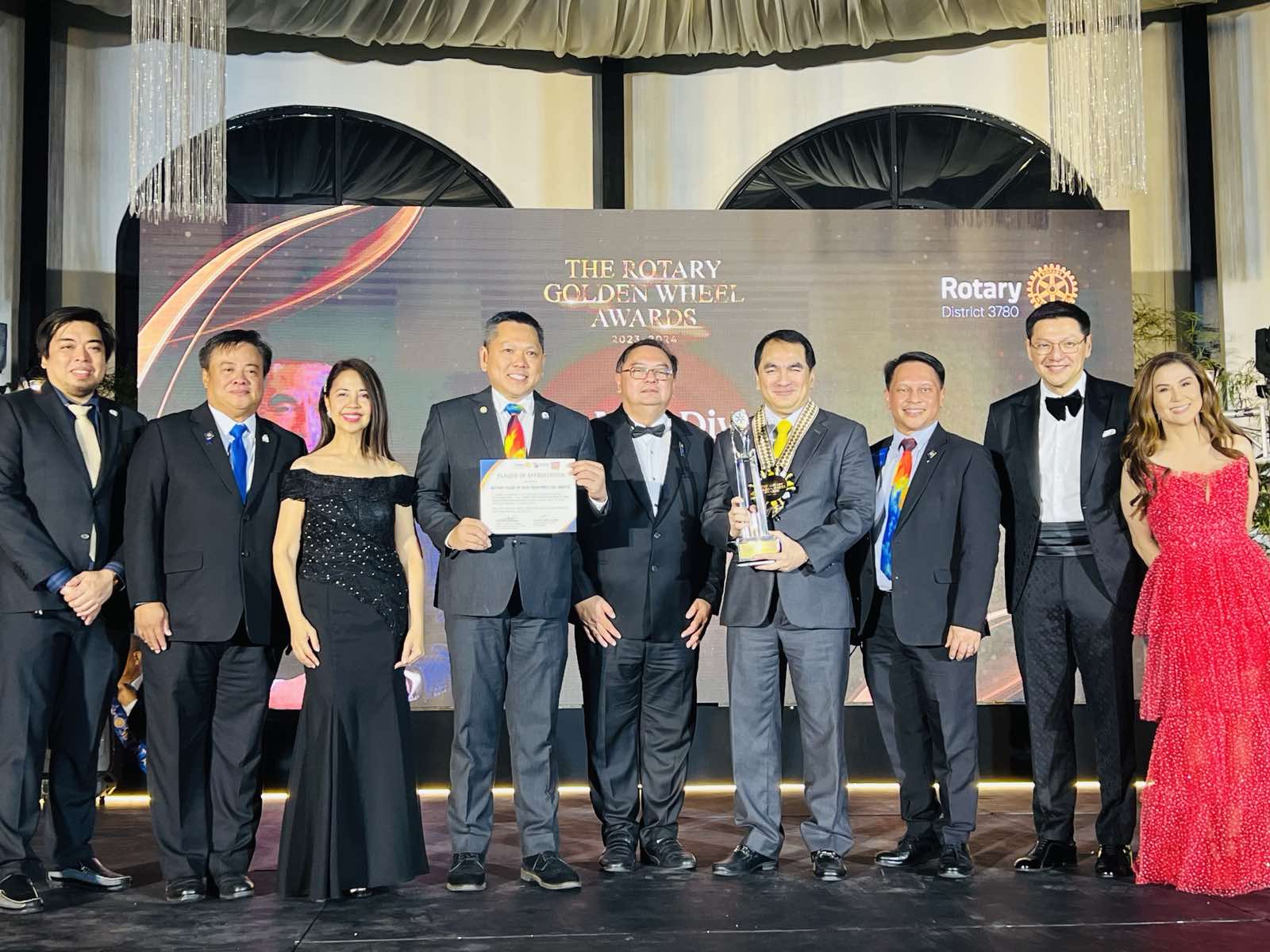 Atty. Divina receives Rotary Golden Wheel Award | DivinaLaw