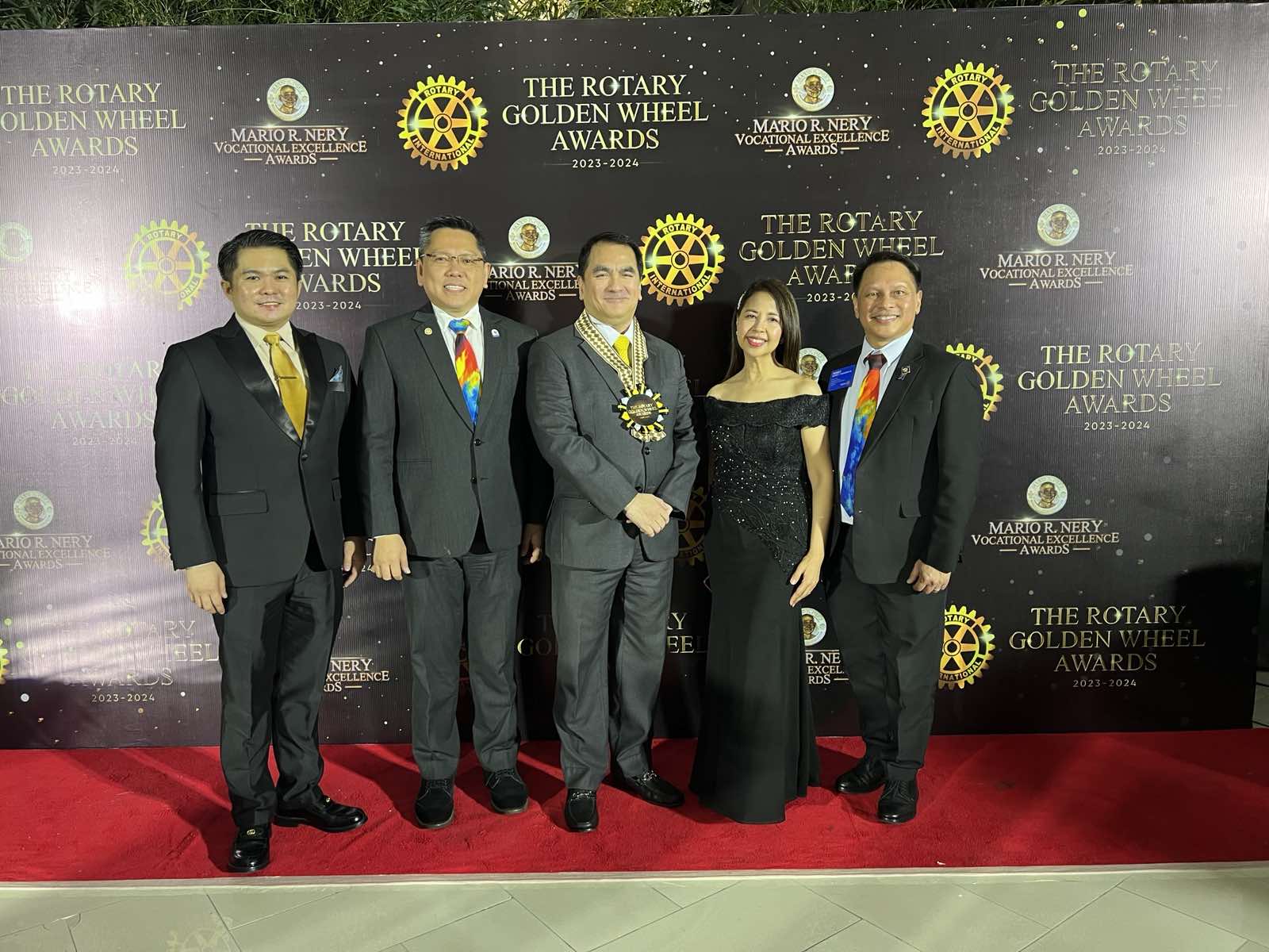 Atty. Divina receives Rotary Golden Wheel Award | DivinaLaw